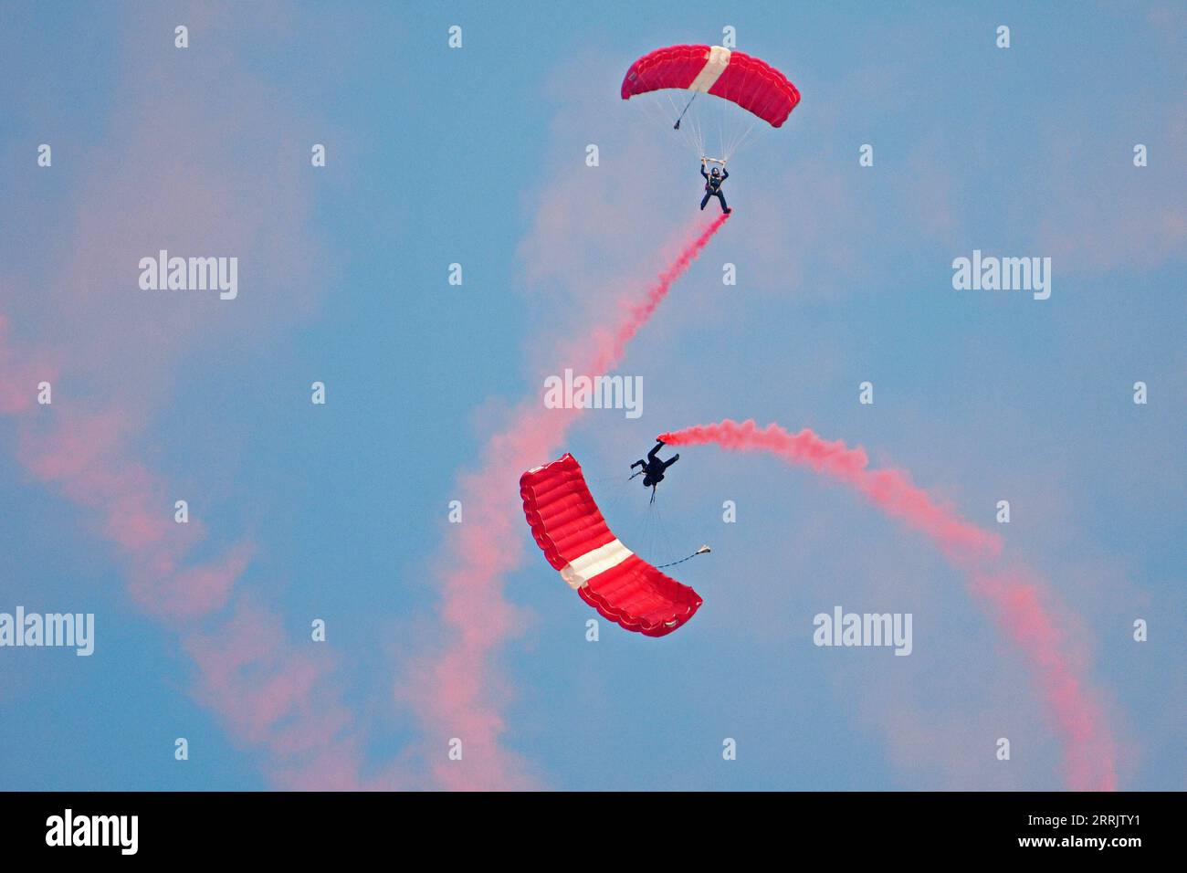 220809 -- SINGAPORE, Aug. 9, 2022 -- Parachutists present a sky diving ...