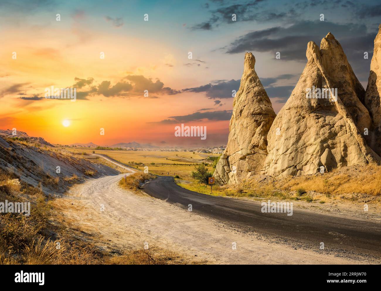 Road in the mountains of Cappadocia at sunset Stock Photo - Alamy
