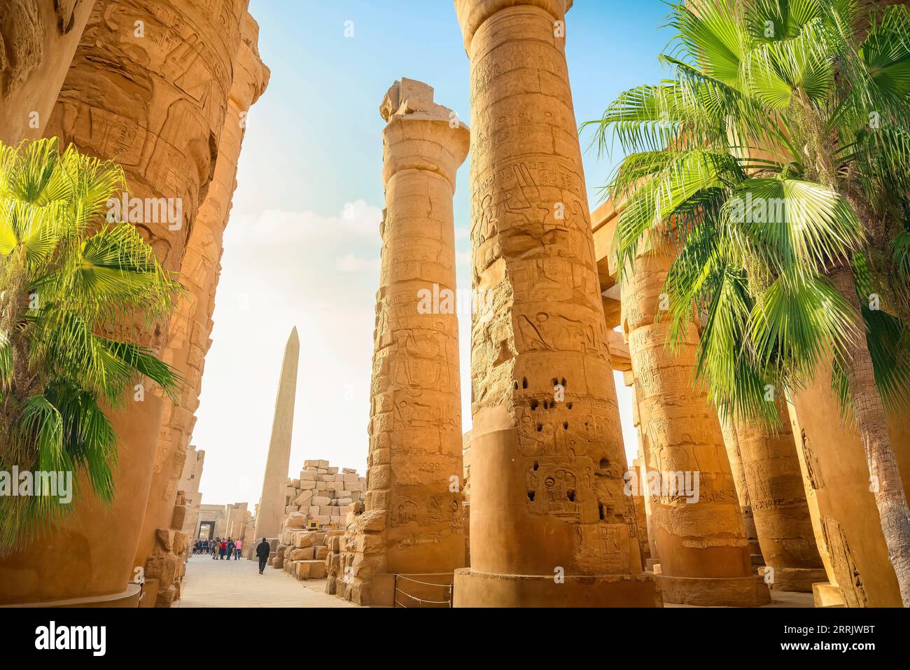 Great columns in Karnak temple at sunrise Stock Photo - Alamy
