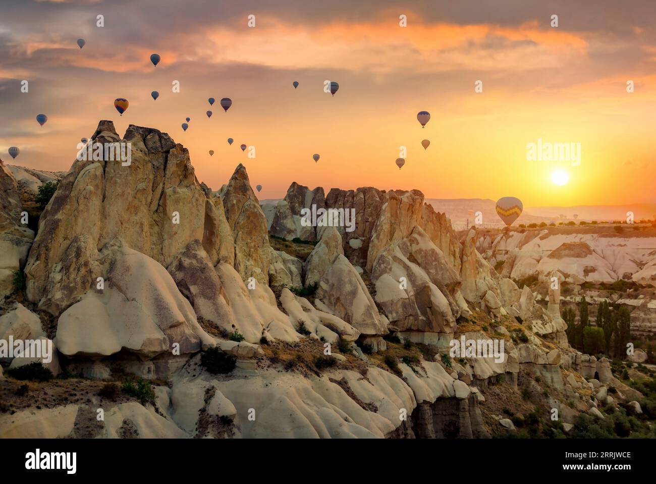 Hot air balloons over mountains hi-res stock photography and images - Alamy