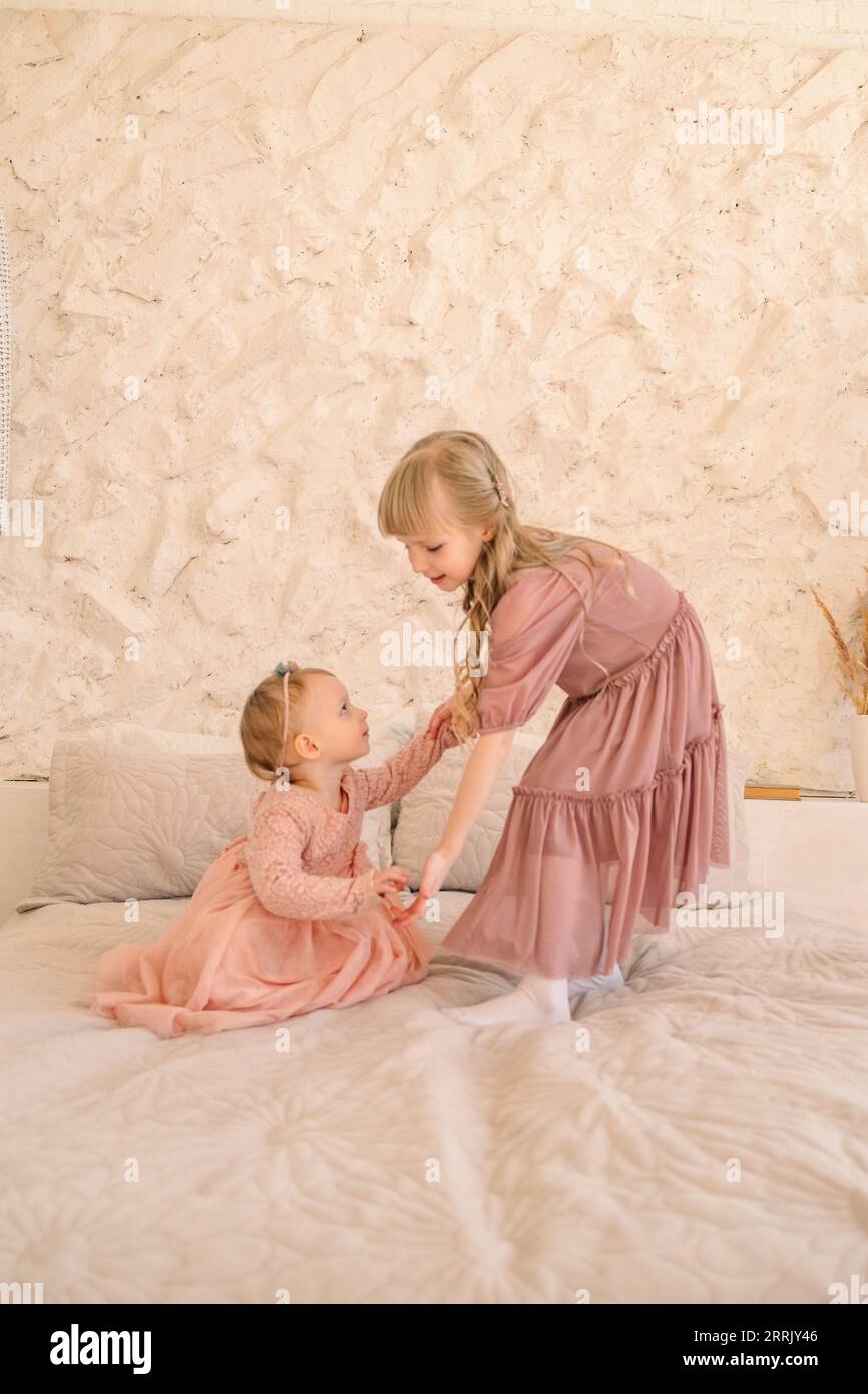two cute sisters portrait Stock Photo - Alamy