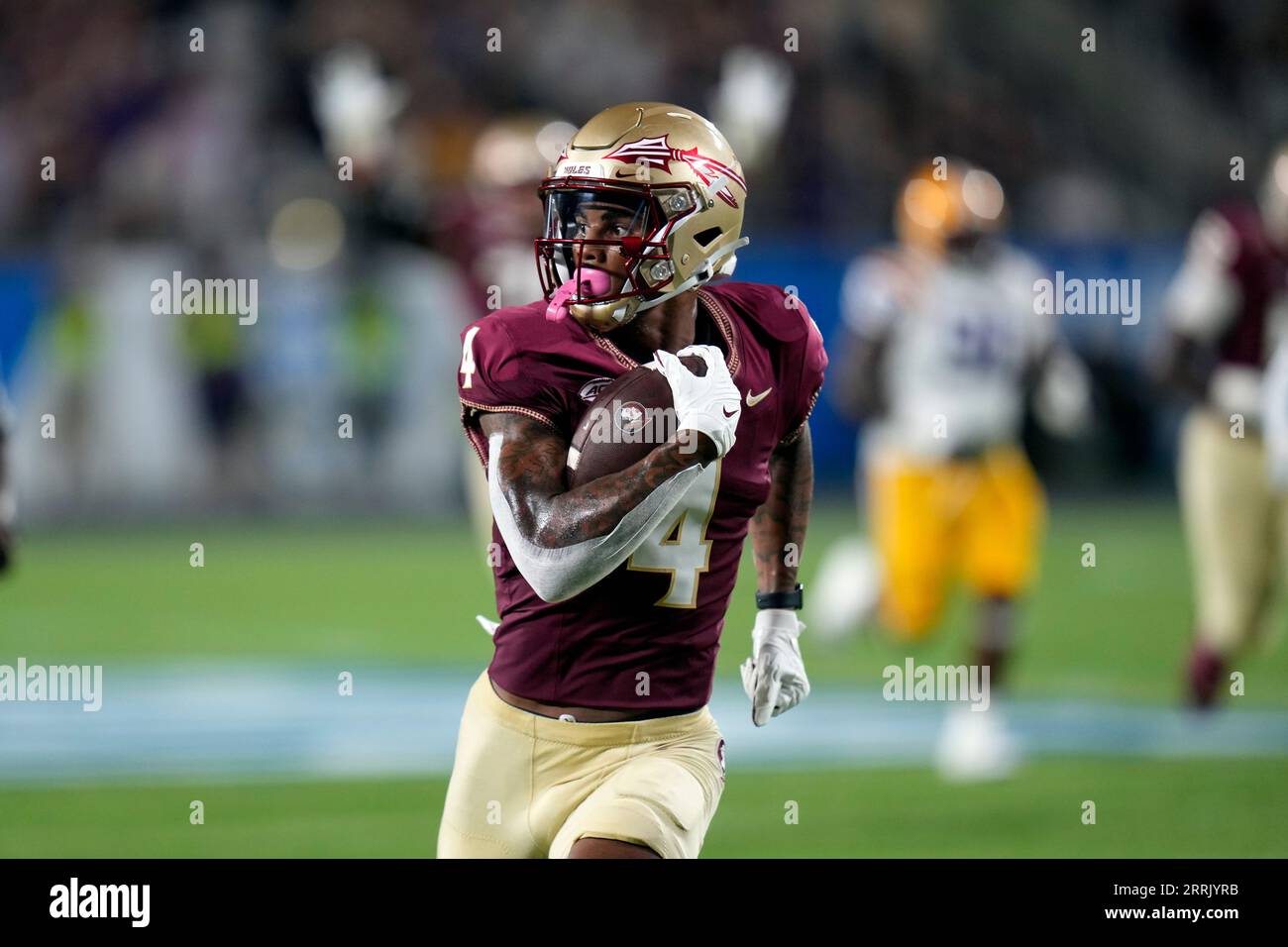 Florida State wide receiver Keon Coleman (4) runs past the LSU defense ...