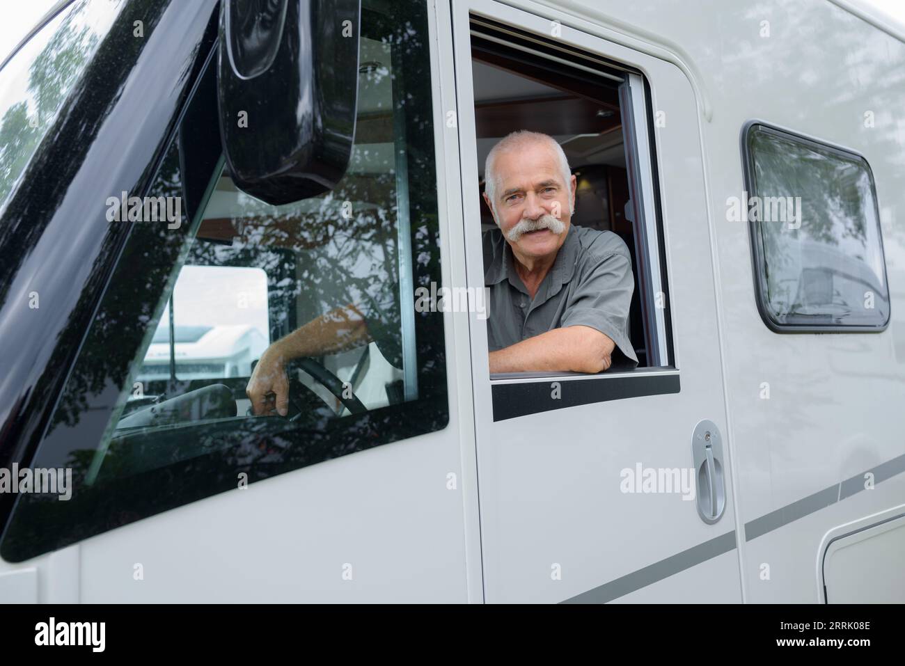 senior man in camper van Stock Photo - Alamy