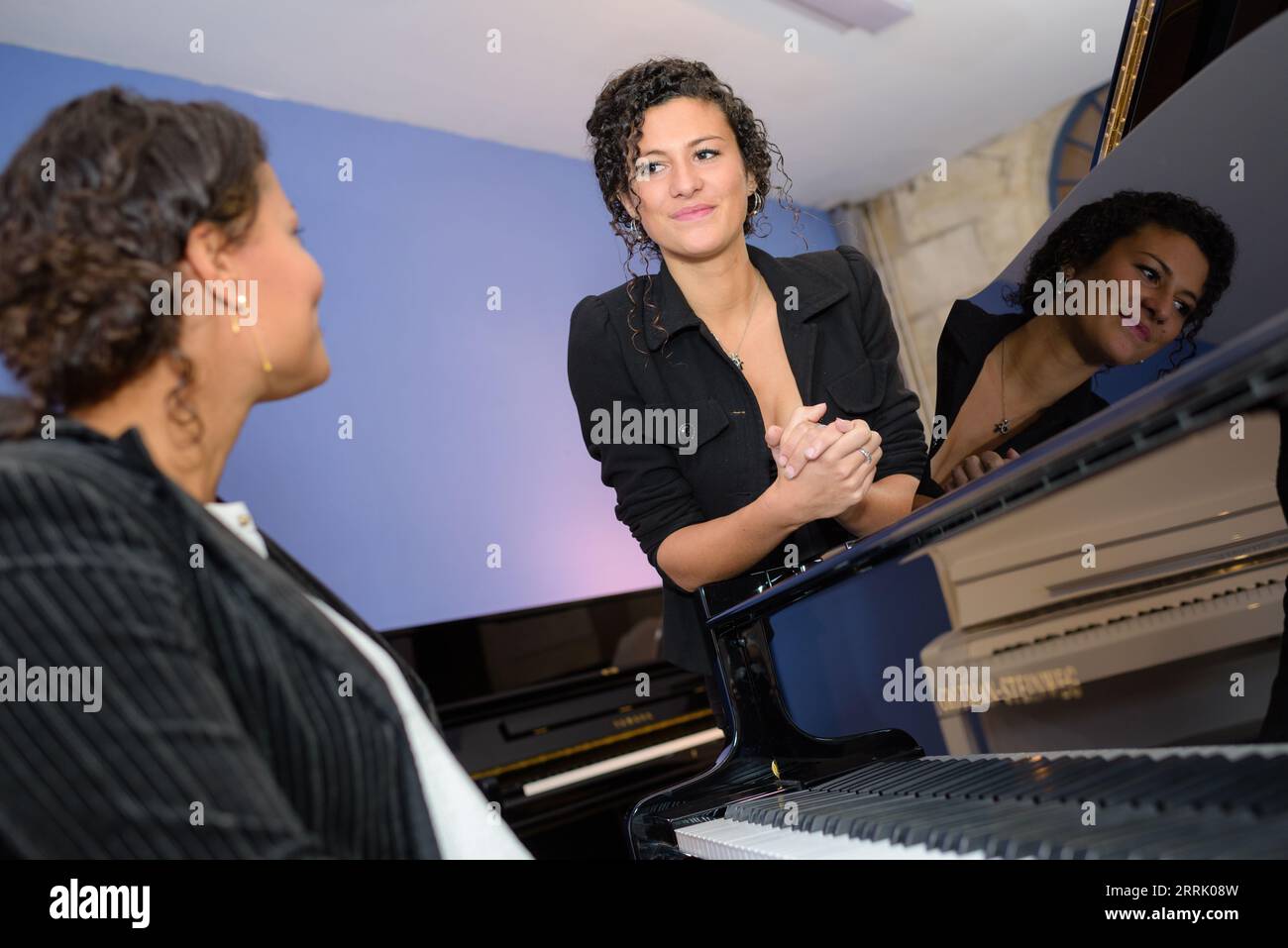 professional musician pianist hands on piano keys Stock Photo - Alamy