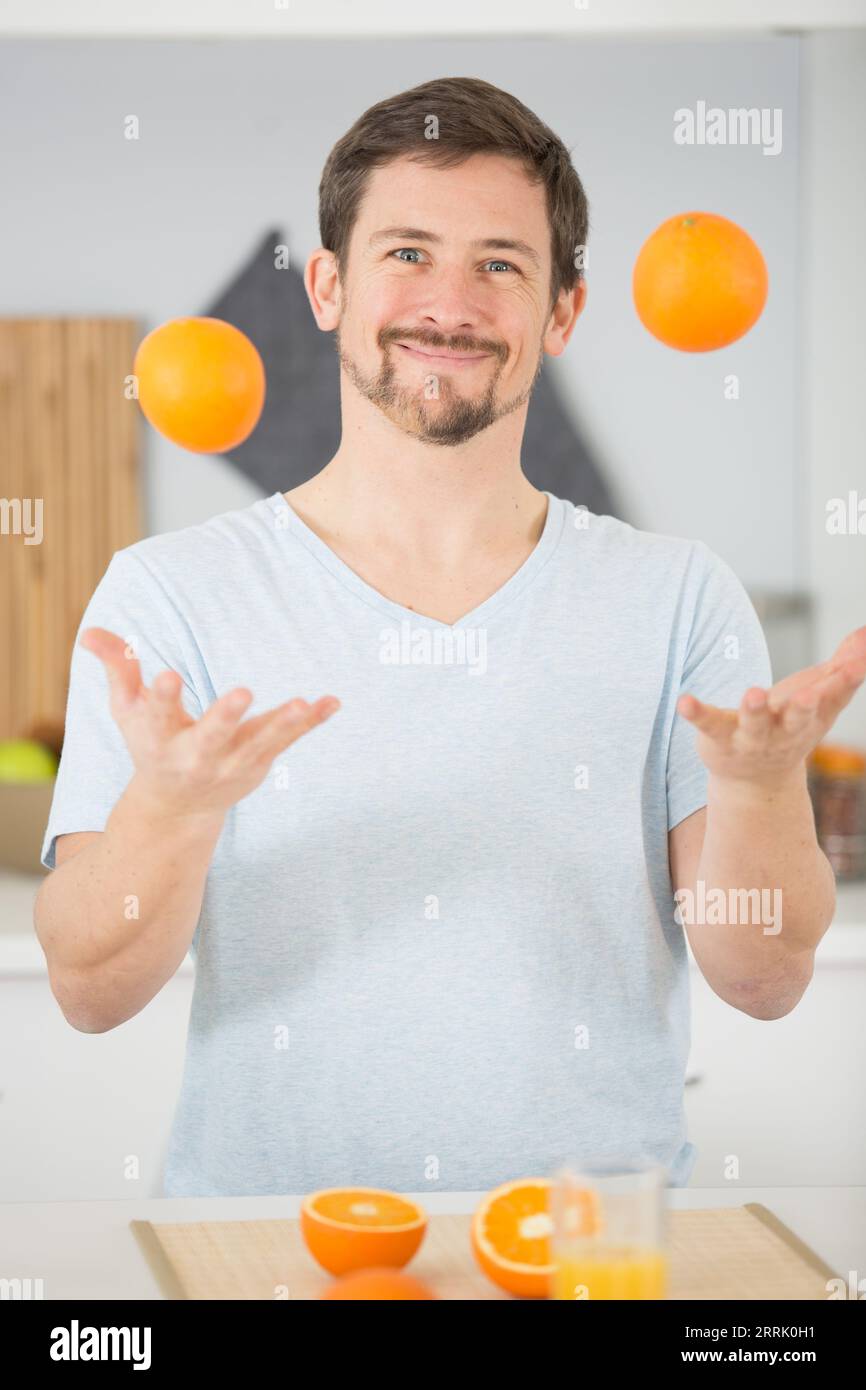 Throwing oranges hi-res stock photography and images - Alamy