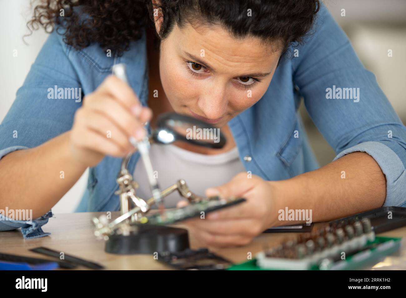 engineer woman repairs laptop support fixing notebook computer Stock ...