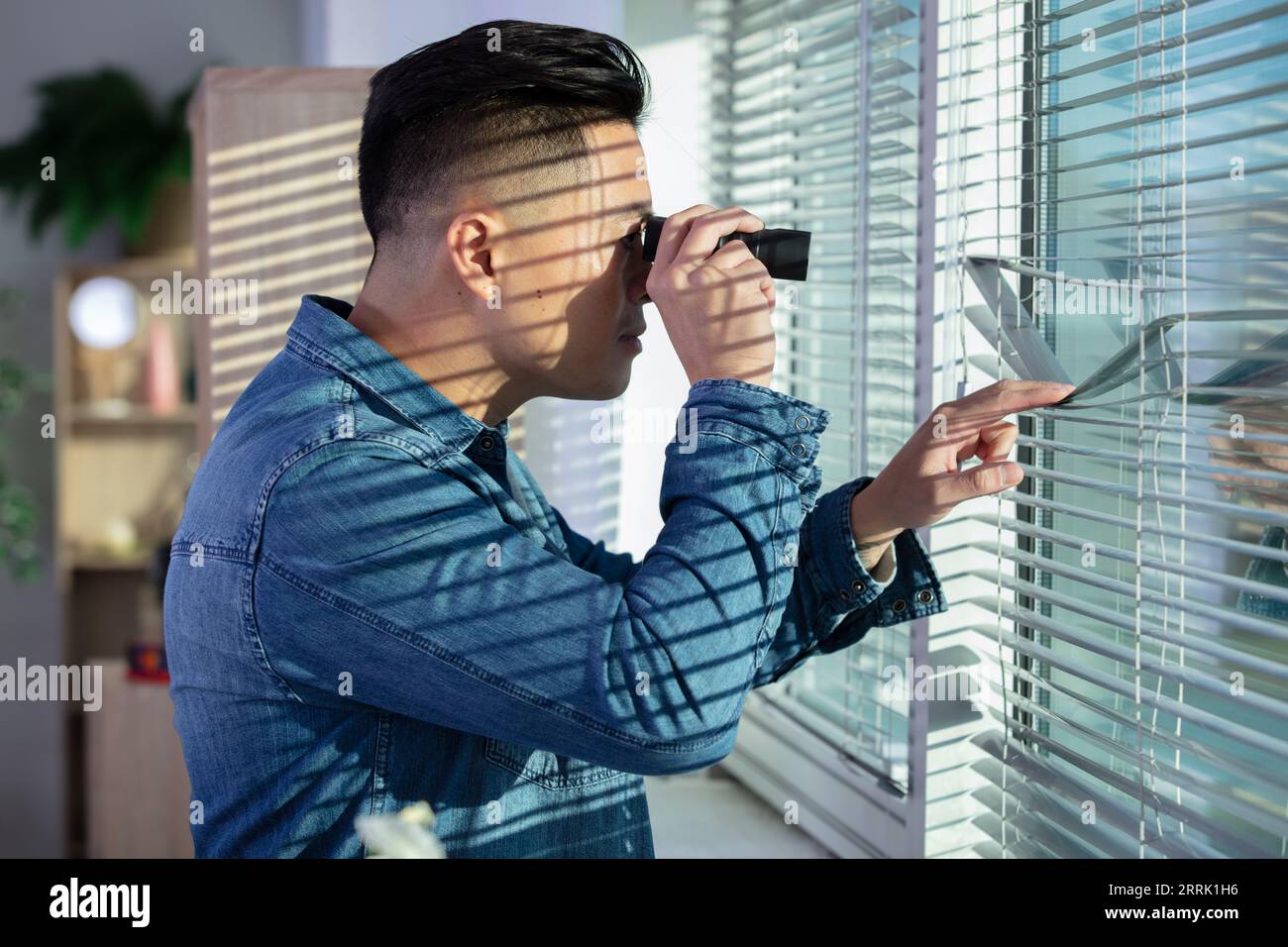 Voyeur, spying hi-res stock photography and images - Alamy