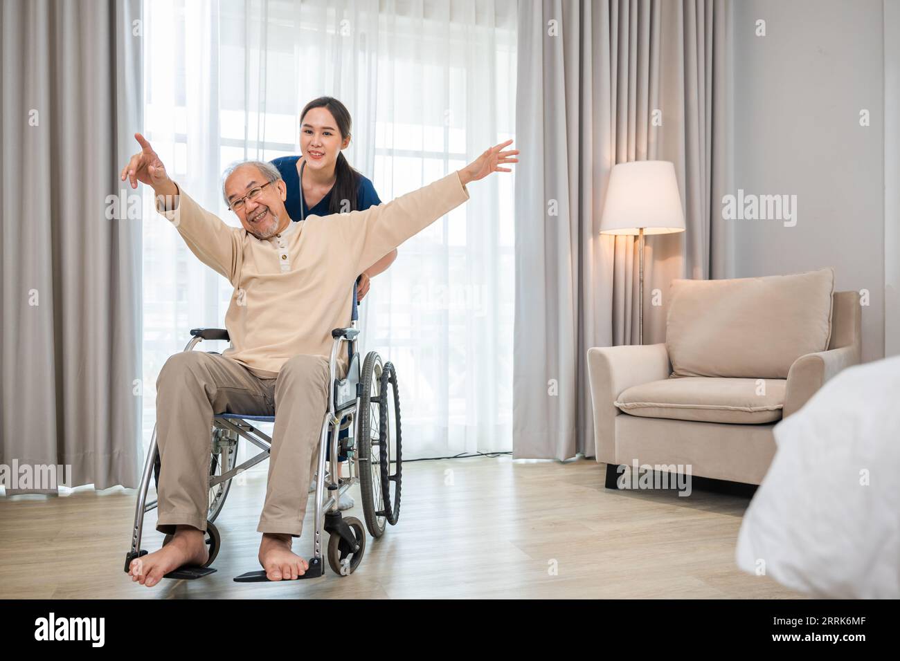 doctor pushing wheelchair and run elderly disabled patient freedom ...