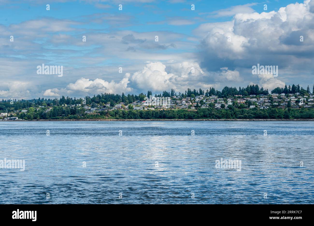 A view of waterfront homes facing the Tacoma Narrows. Photo taken from ...