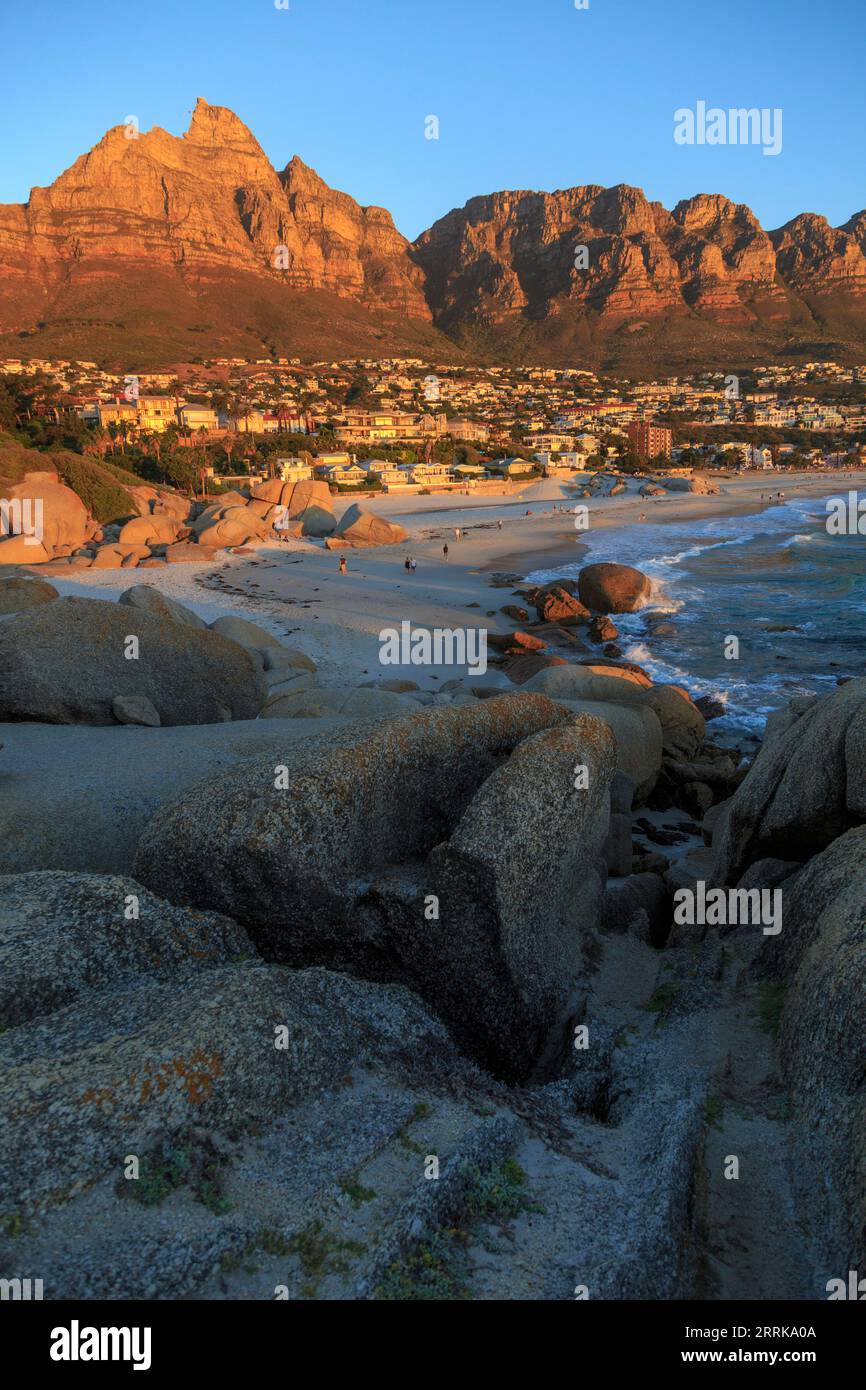 South Africa, Cape Town, Camps Bay, view of Camps Bay at sunset in ...