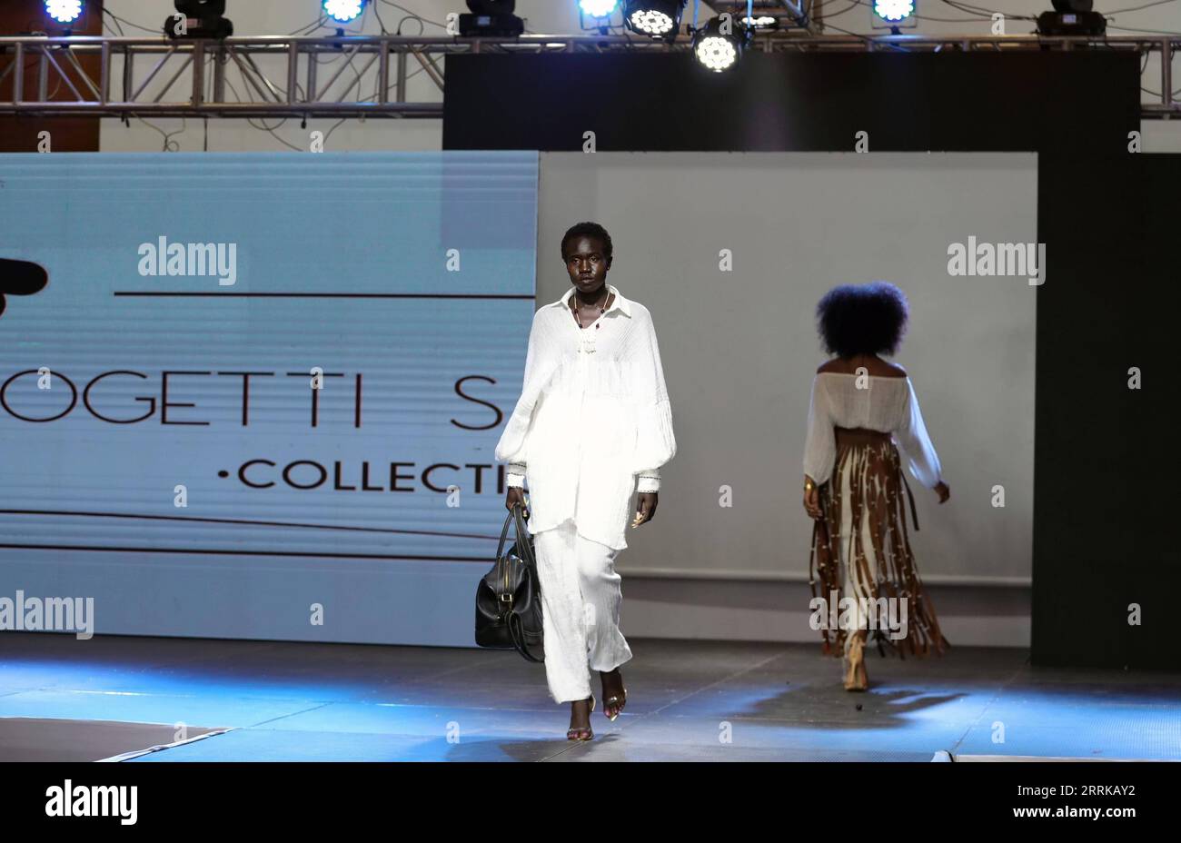220828 -- ADDIS ABABA, Aug. 28, 2022 -- Models present creations during ...