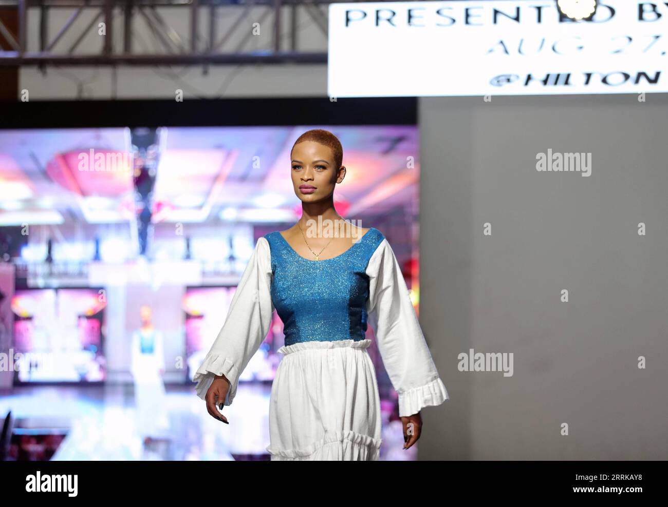 220828 -- ADDIS ABABA, Aug. 28, 2022 -- A model presents a creation ...