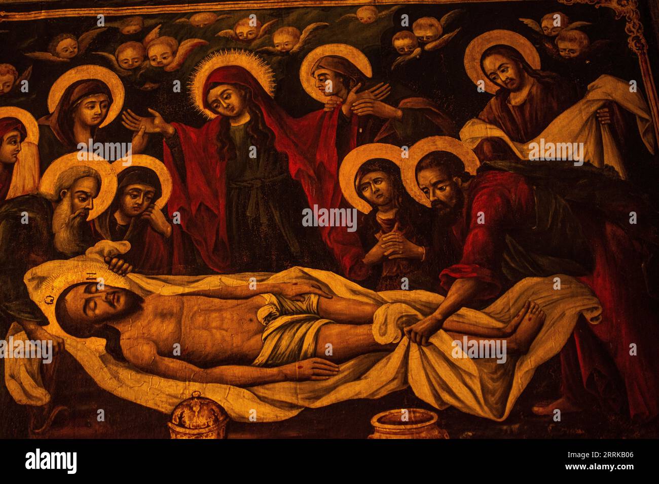 An oil painting featuring a central figure of Jesus Christ on a ...