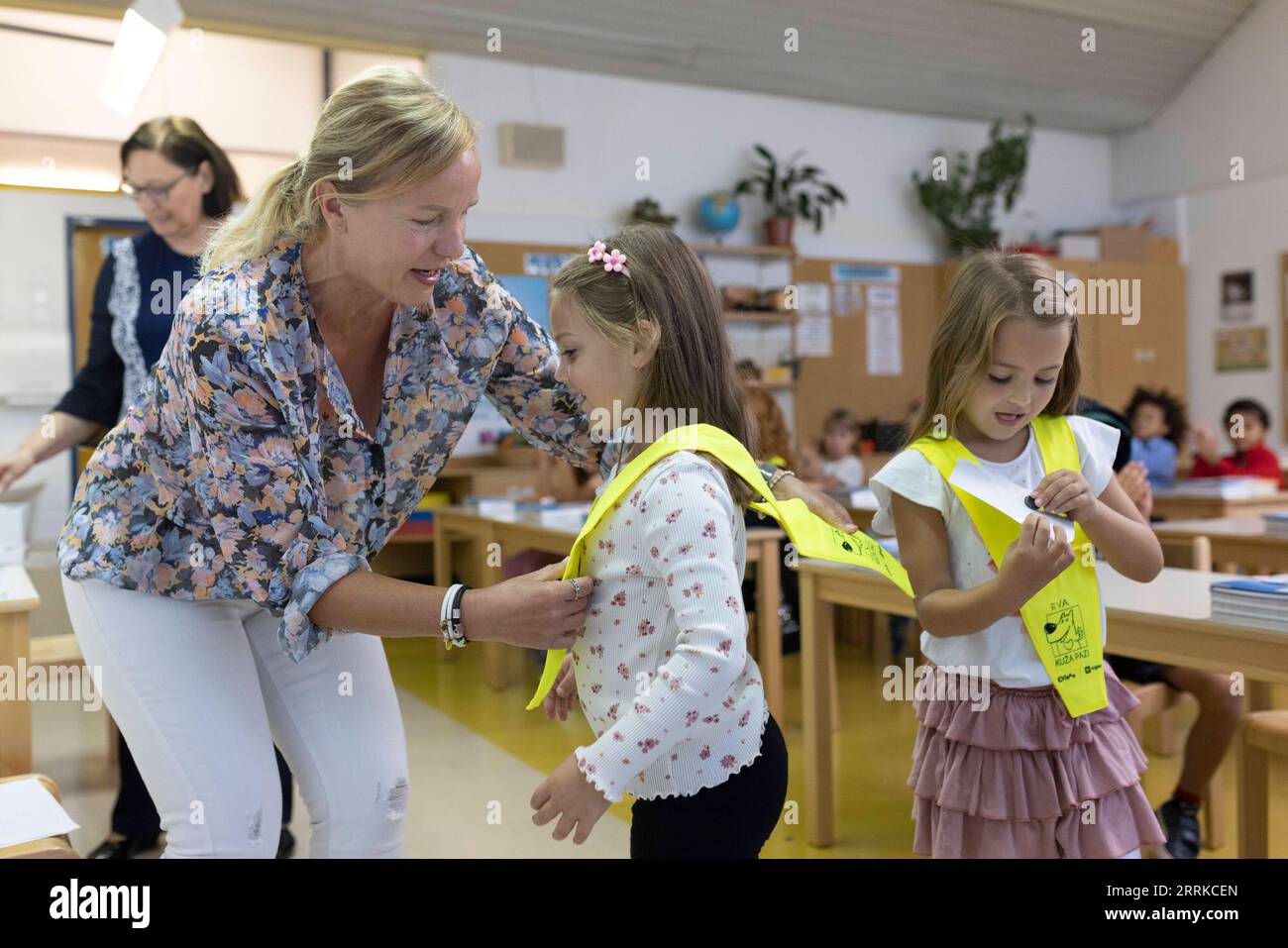 220902 -- LJUBLJANA, Sept. 2, 2022 -- First graders receive vests used ...