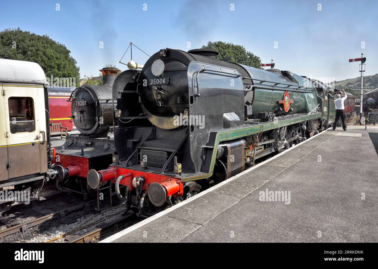 Two steam trains at the GWR preserved train station platform Winchcombe ...