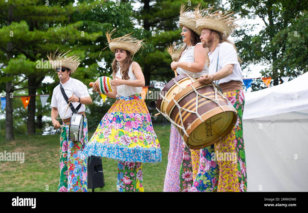 220906 -- TORONTO, Sept. 6, 2022 -- Dressed-up stilt walkers perform ...