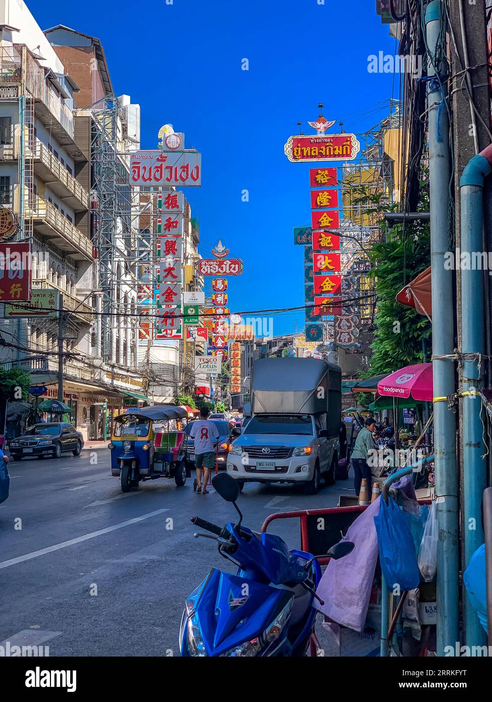 Yaowarat Road in Chinatown, billboards, stores, restaurants, hotels ...