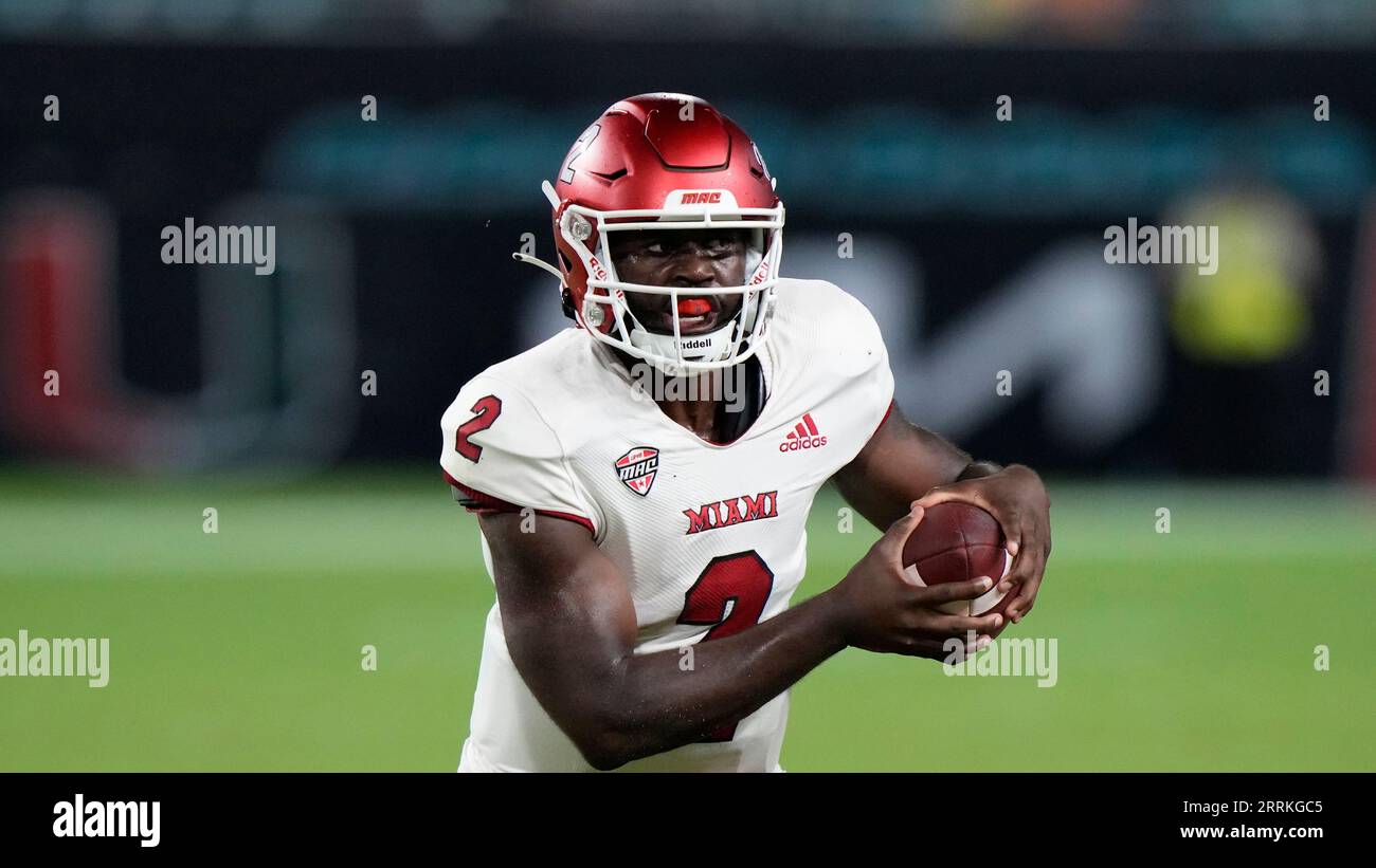 Miami (Ohio) quarterback Aveon Smith (2) scrambles during the second ...