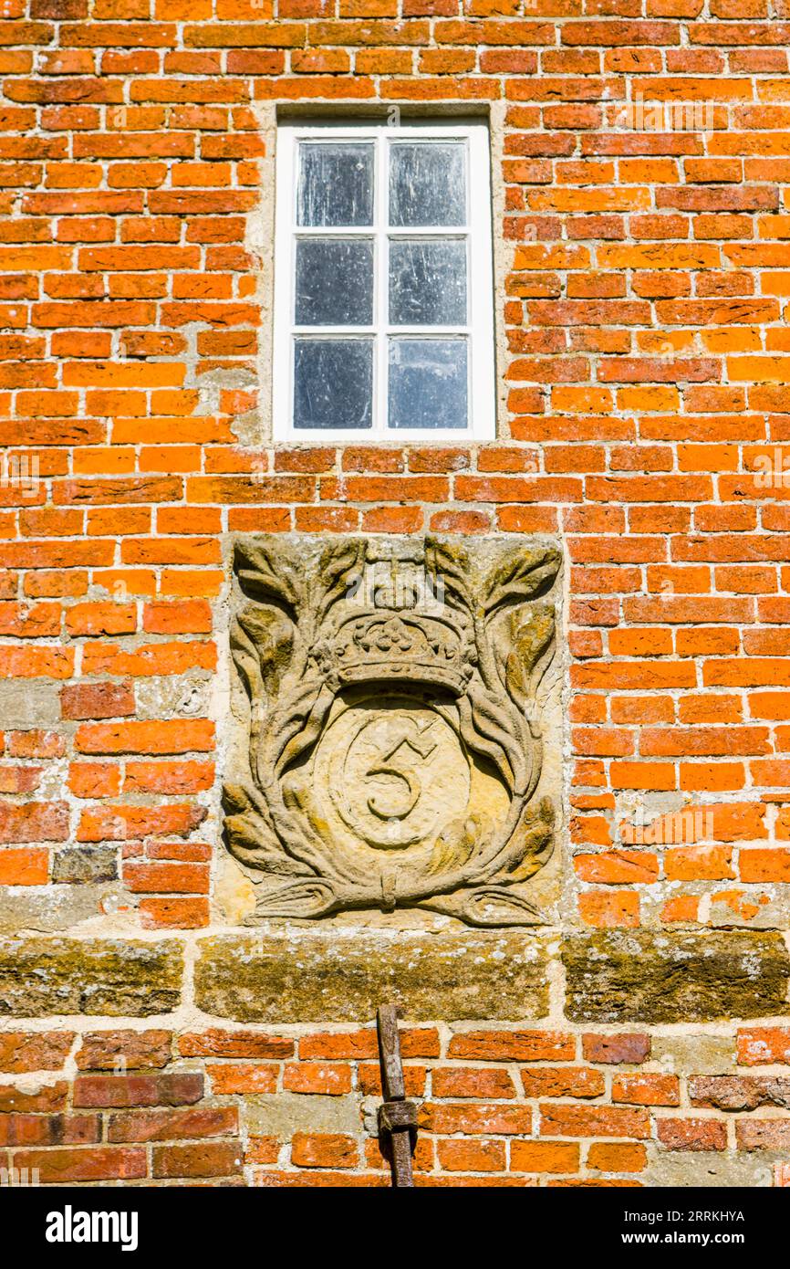 Detail on the west side of the church tower of Schwei with the count's ...