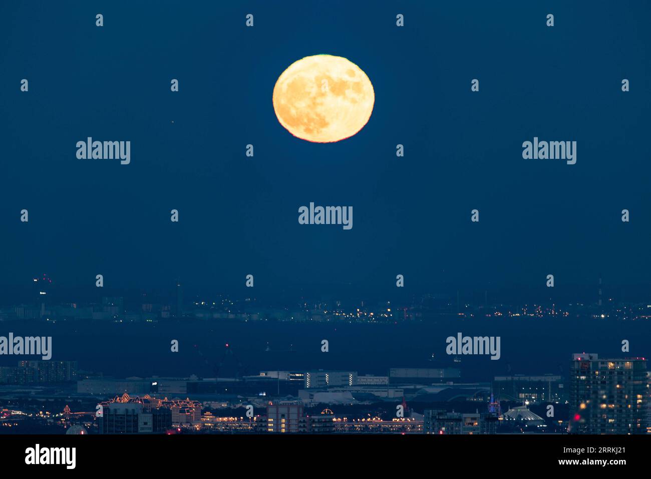 220910 -- TOKYO, Sept. 10, 2022 -- A full moon rises in the sky as seen ...