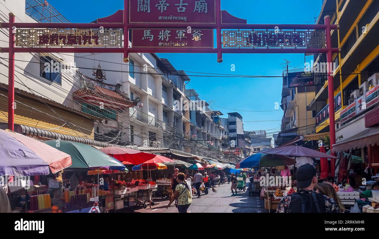 Yaowarat Road in Chinatown, billboards, stores, restaurants, hotels ...