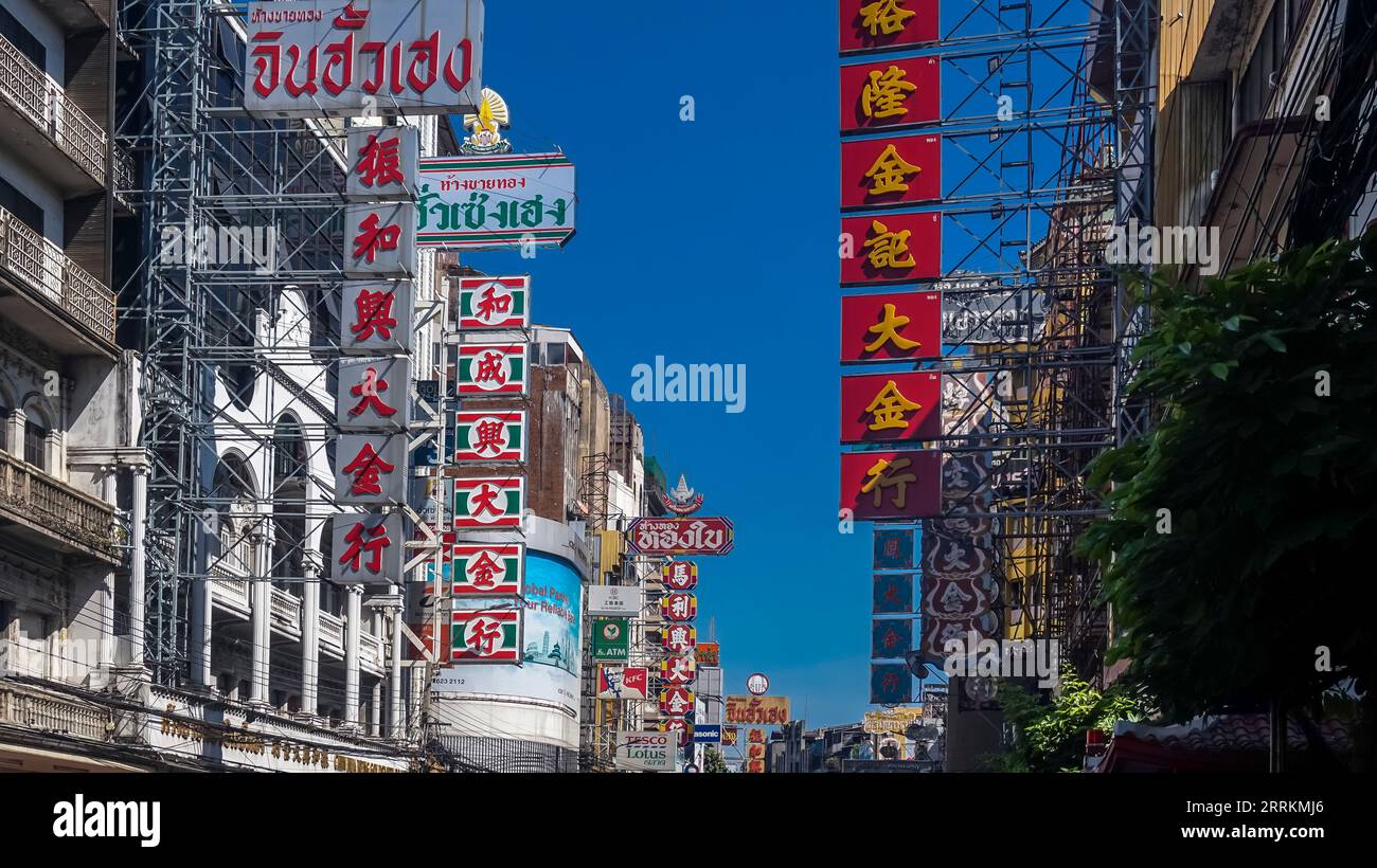Yaowarat Road in Chinatown, billboards, stores, restaurants, hotels ...