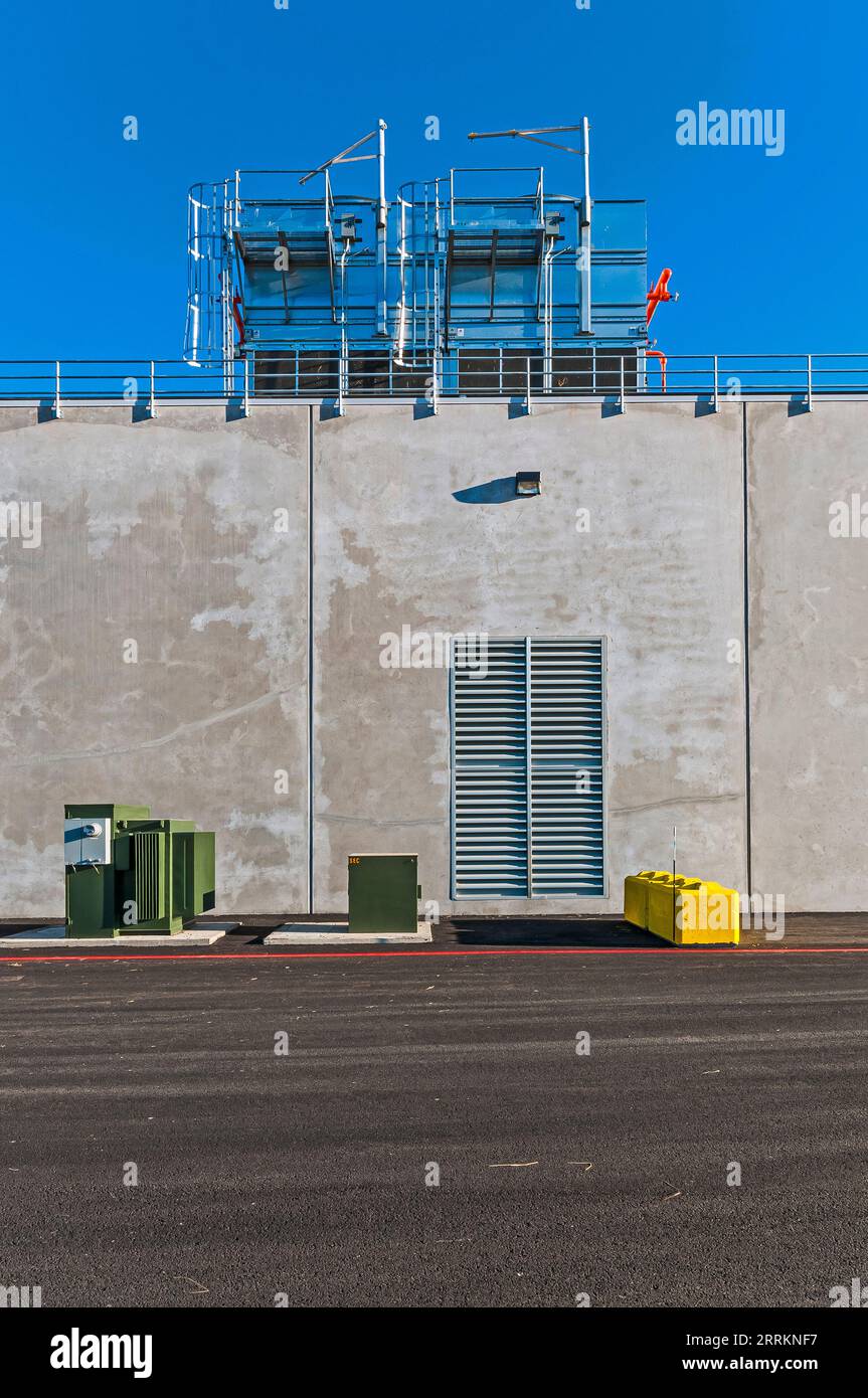 Exterior of concrete cold-storage facility, showing refrigeration ...