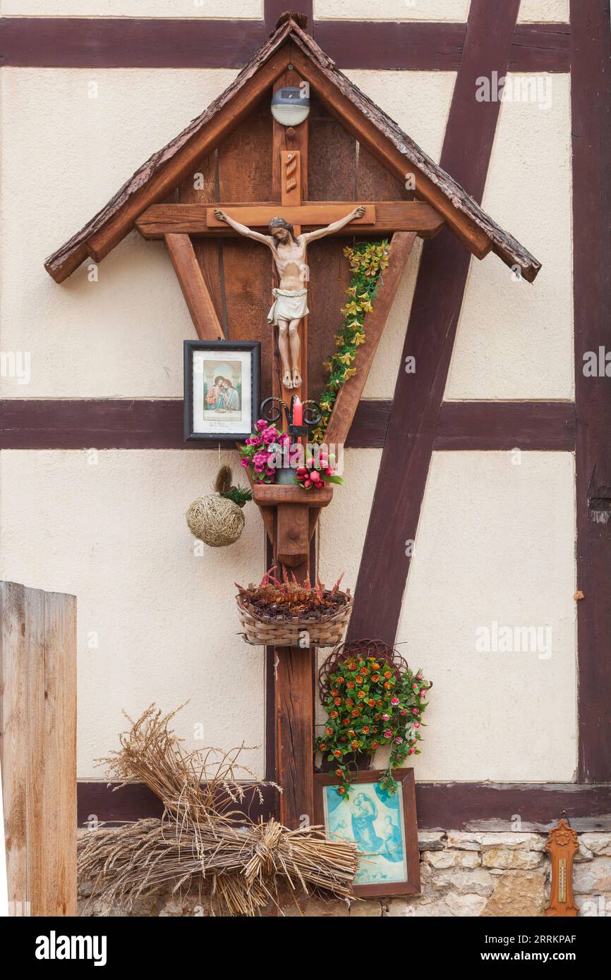 Old crucifix on a half timbered house hi-res stock photography and ...