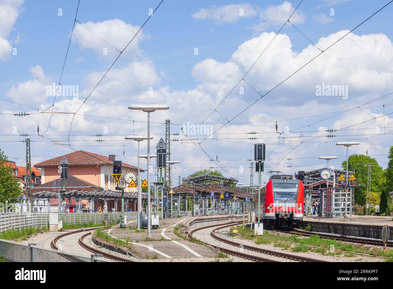 Railroad station with railroad facilities and local train, Starnberg ...