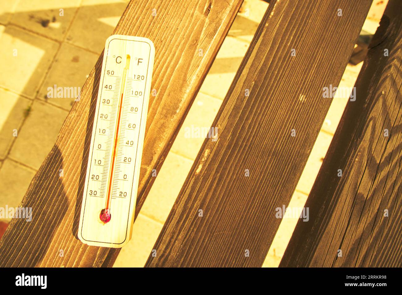 Thermometer on park bench hot day.High air temperature.Sultry summer ...