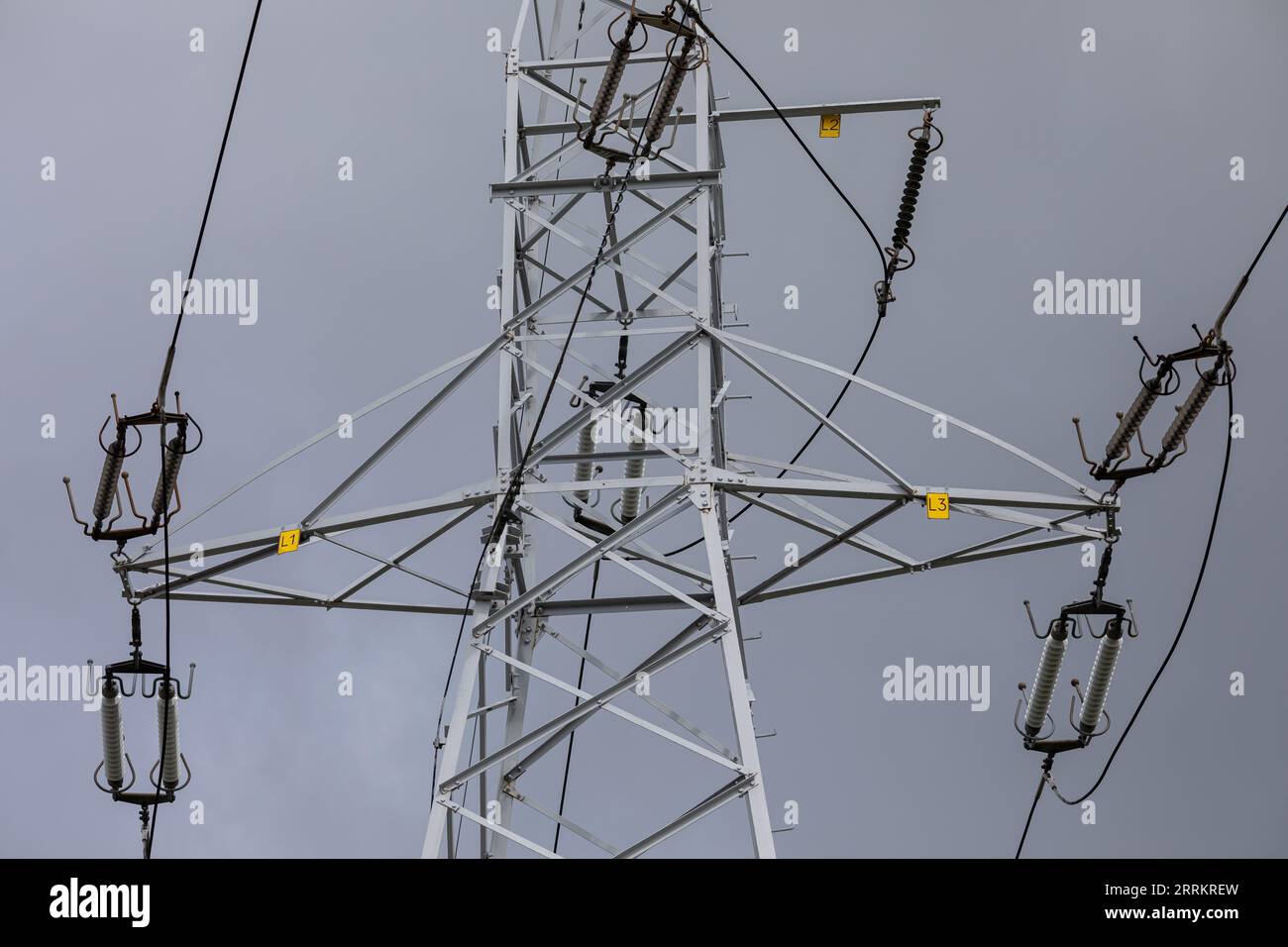 Bottom view of a section of a high-voltage overhead line pole Stock ...