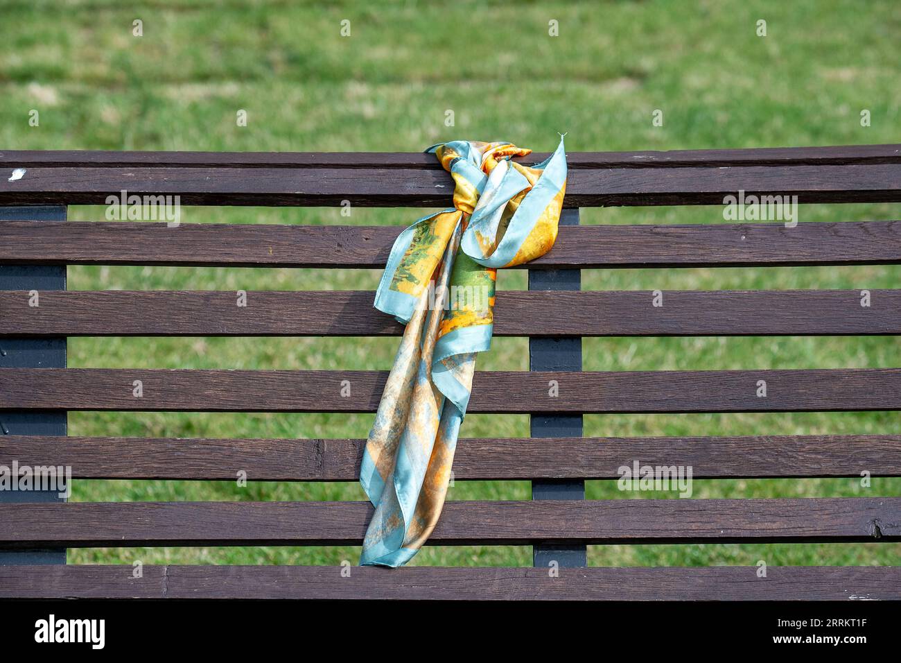 Flowers tied to a bench hi-res stock photography and images - Alamy