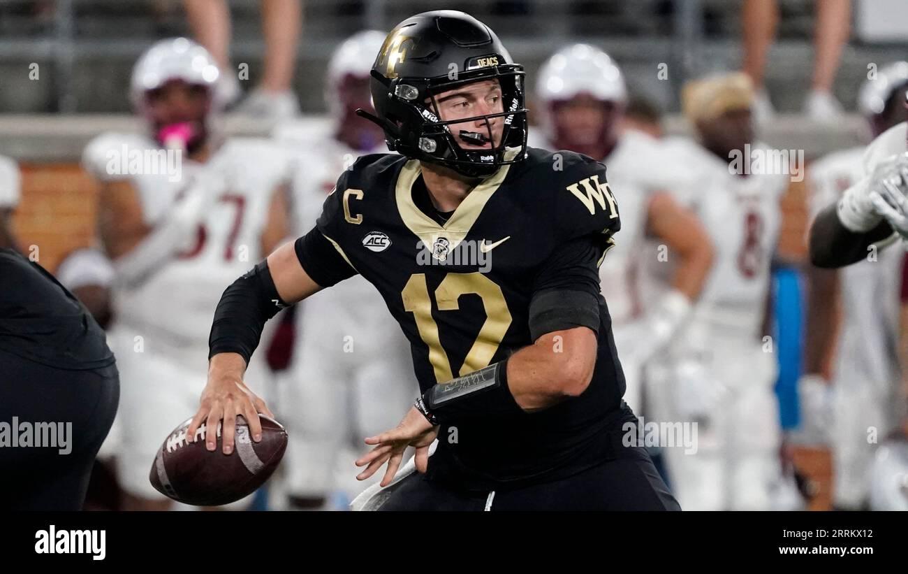 Wake Forest quarterback Mitch Griffis (12) looks to pass against Elon ...