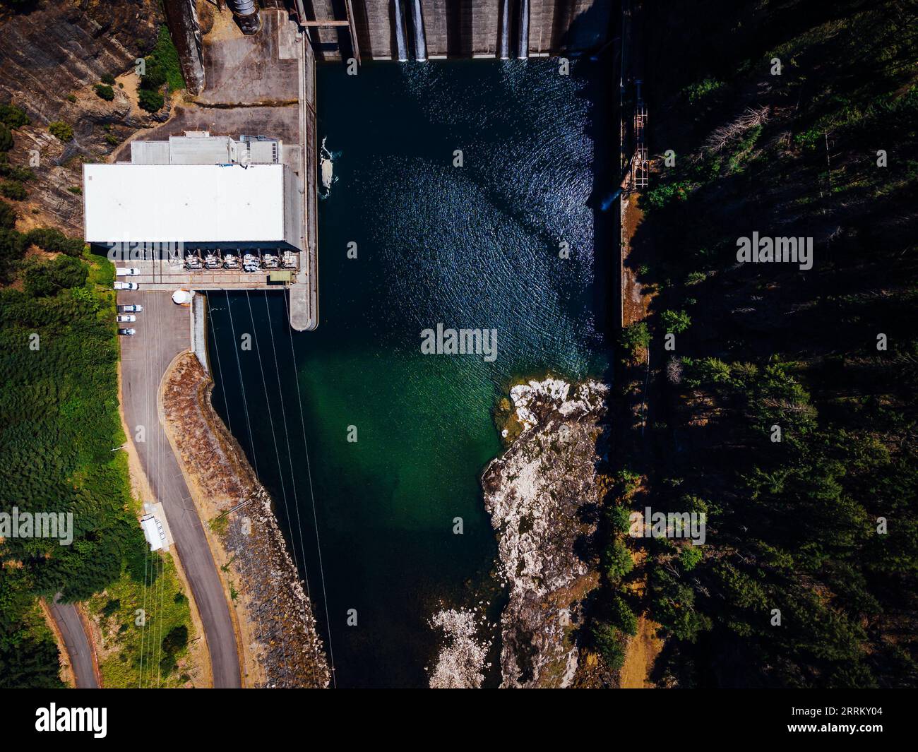 An aerial view of a Detroit Dam surrounded by lush green in Detroit on ...
