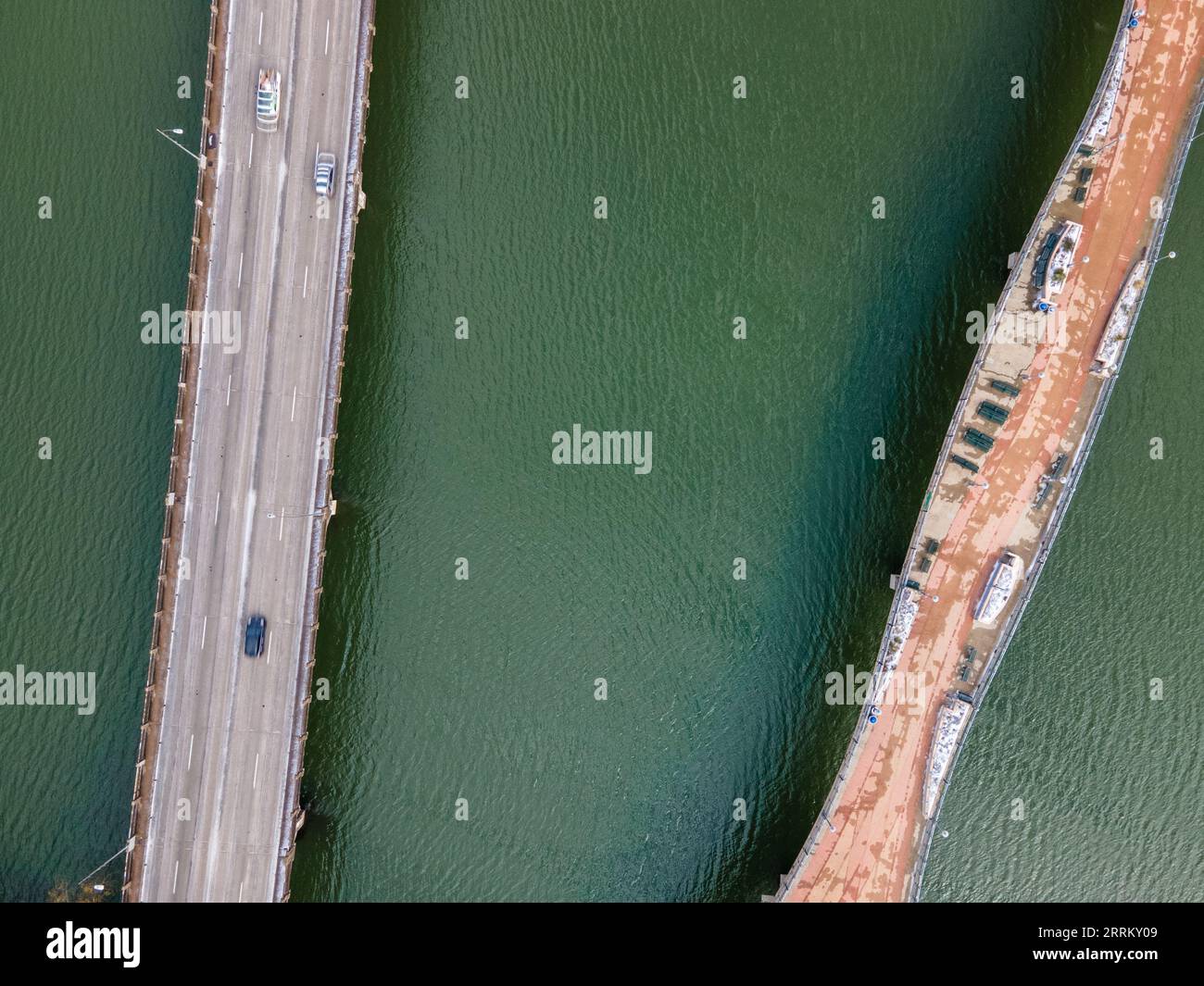 An aerial view of a freeway bridge crossing over a river in Texas Stock ...