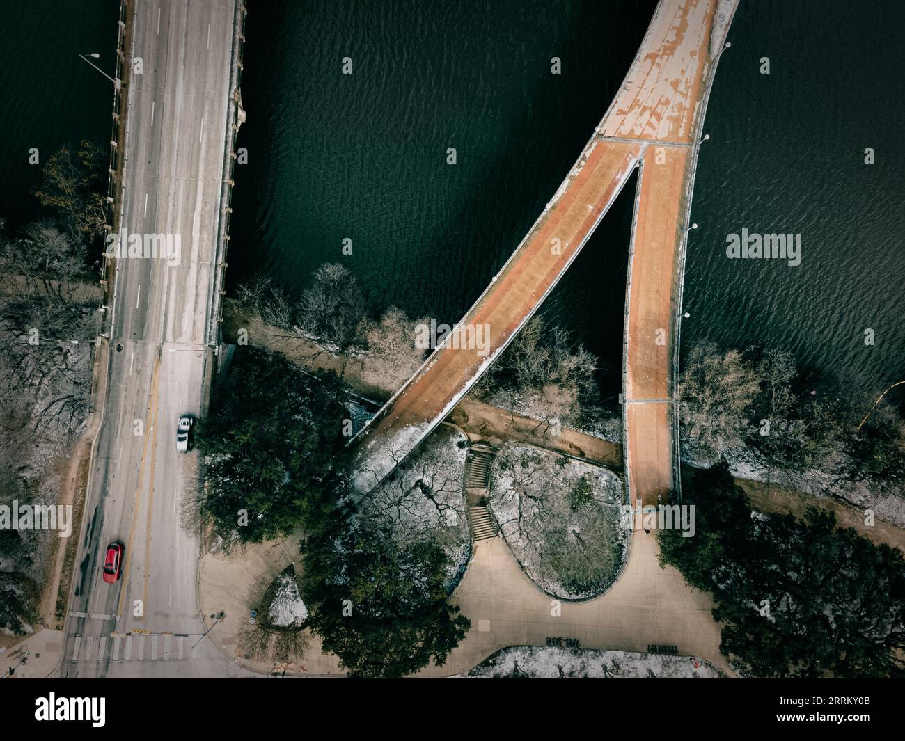 An aerial view of a freeway bridge crossing over a river in Texas Stock ...