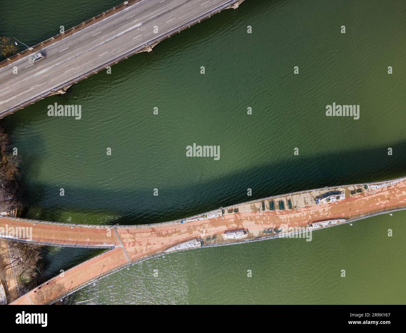 An aerial view of a freeway bridge crossing over a river in Texas Stock ...