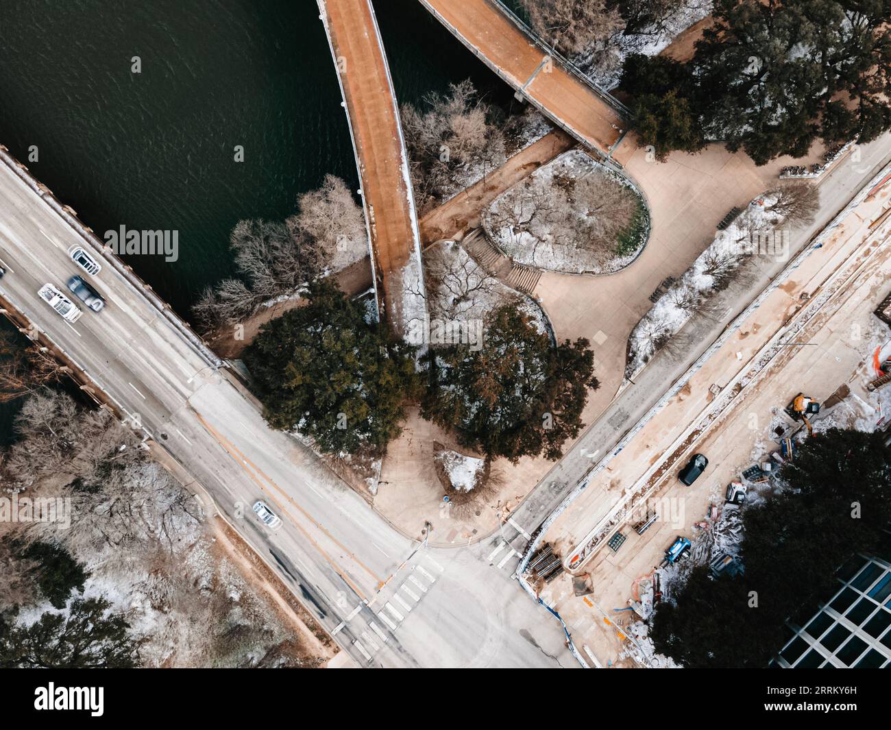An aerial view of a freeway bridge crossing over a river in Texas Stock ...