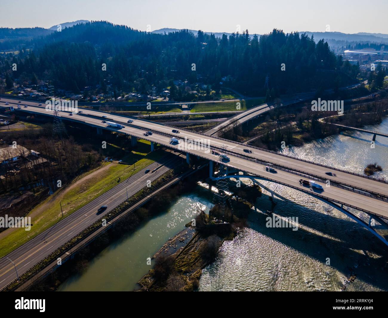 An aerial view of a freeway bridge crossing over a river in Eugene ...