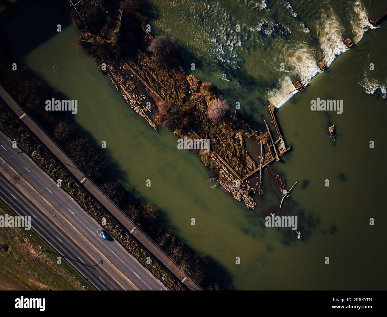 An aerial view of a freeway bridge crossing over a river in Eugene ...