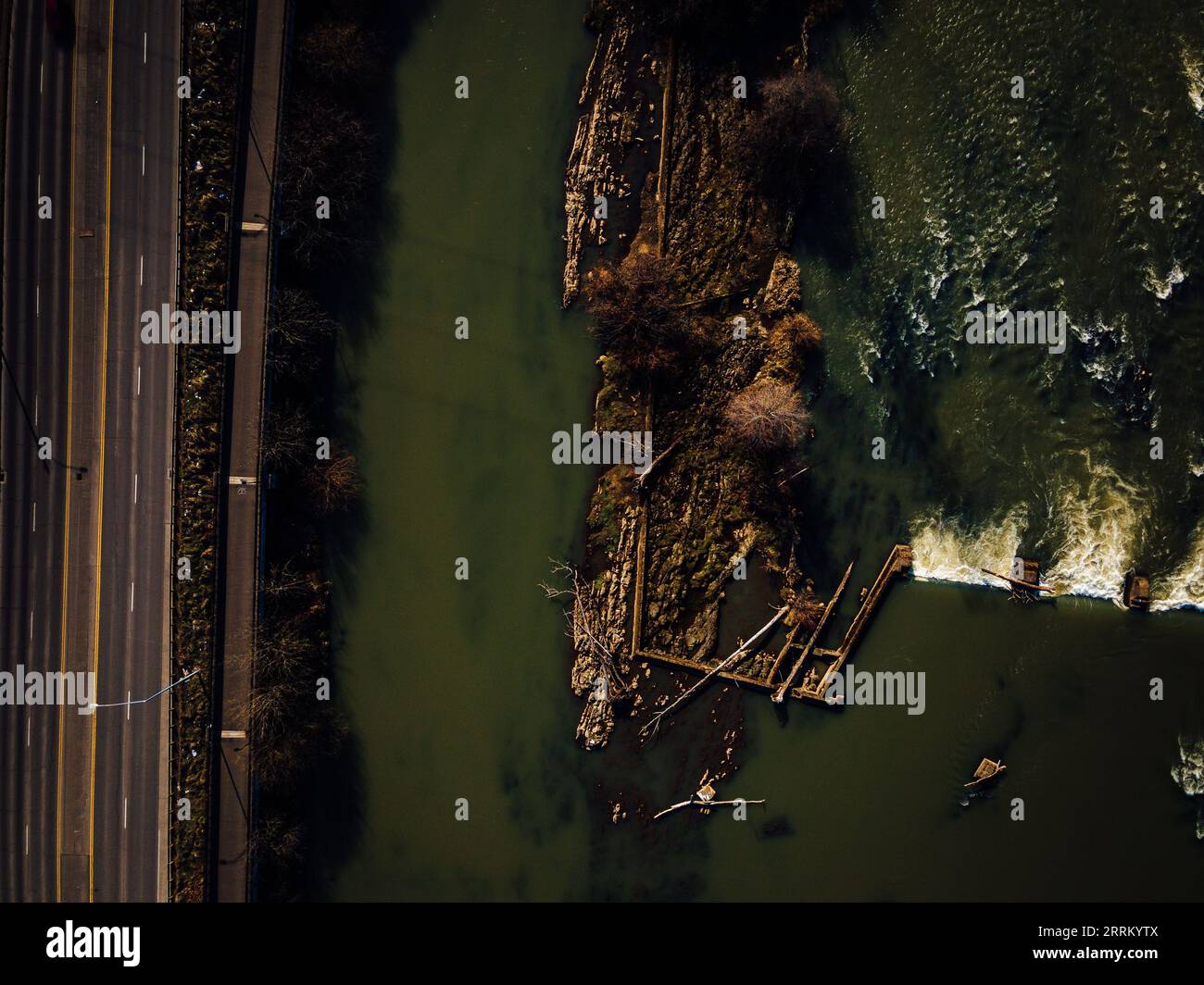 An aerial view of a freeway bridge crossing over a river in Eugene ...