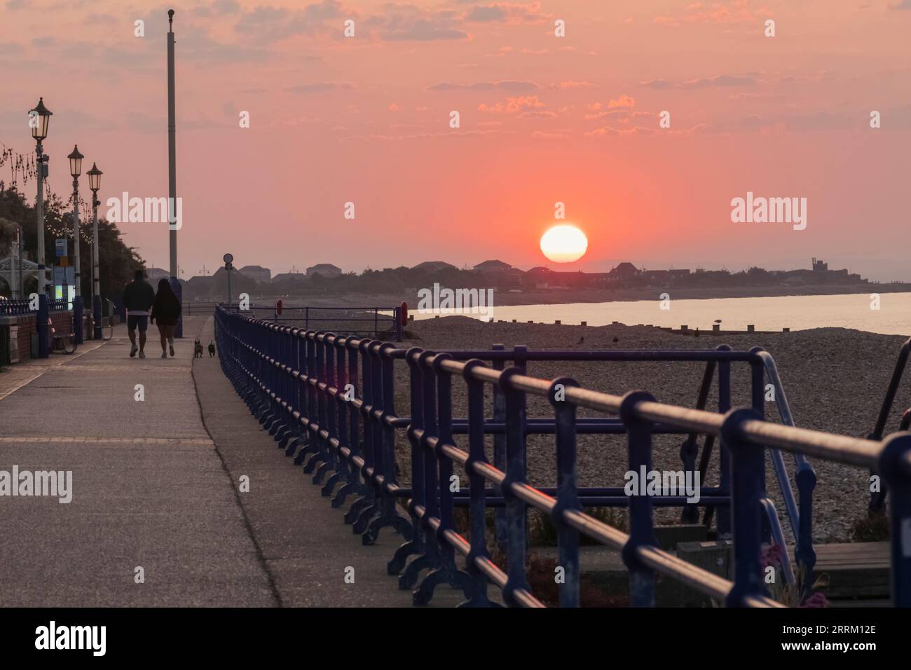 Eastbourne seafront beach and promenade at sunrise hi-res stock ...