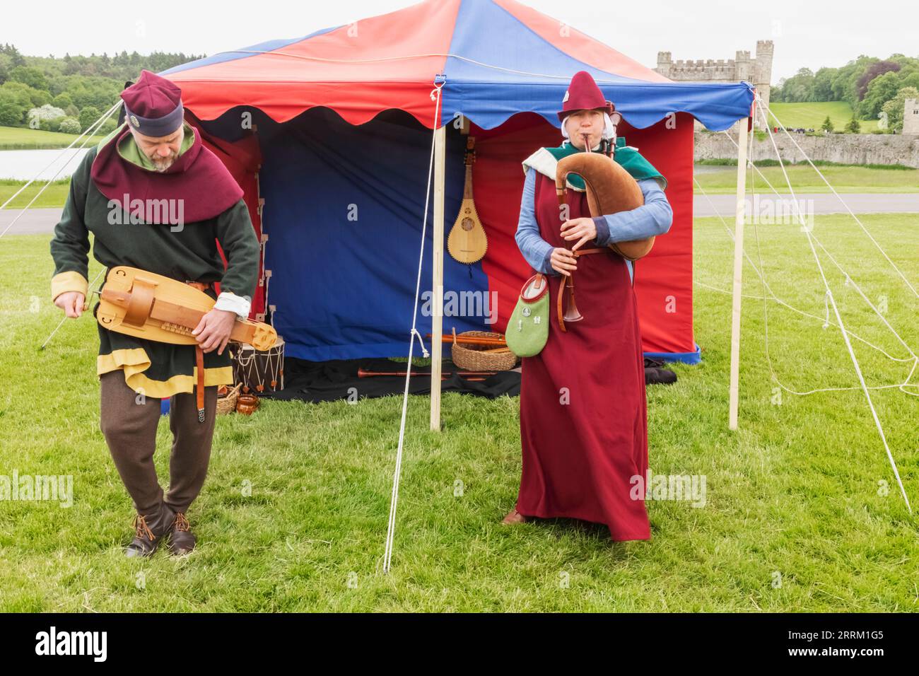 Couple playing medieval musical instruments hi-res stock photography ...