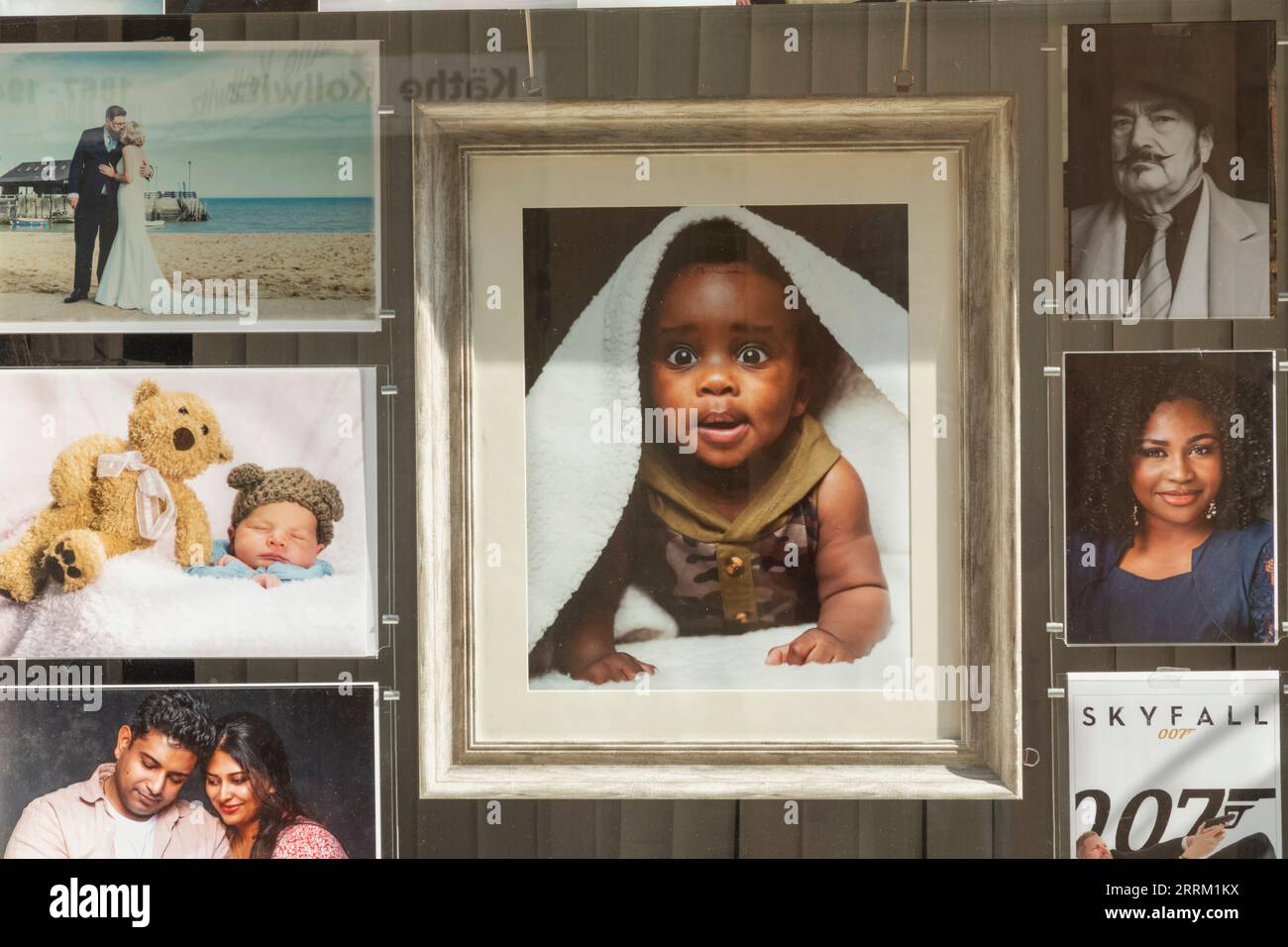 Photographers window studio display of portraits hi-res stock ...