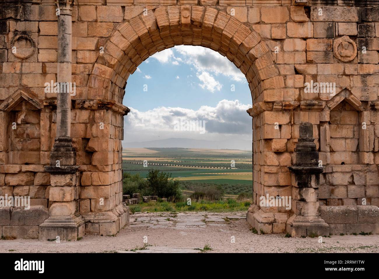 Iconic Triumphal Arch of Volubilis, an old ancient Roman city in ...