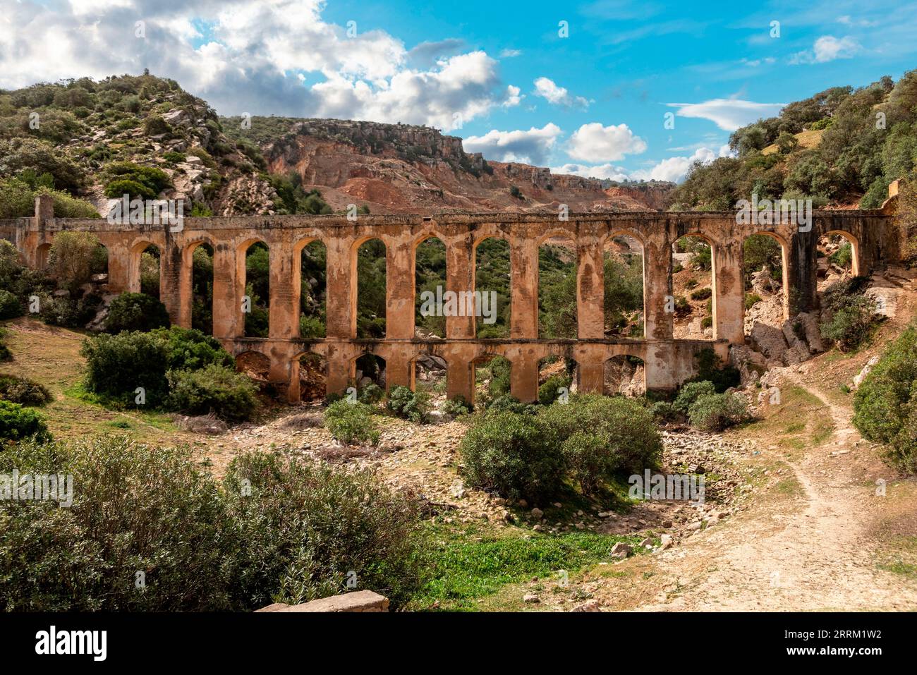 Ancient Haroune aqueduct near the archeological Roman city of Volubilis ...