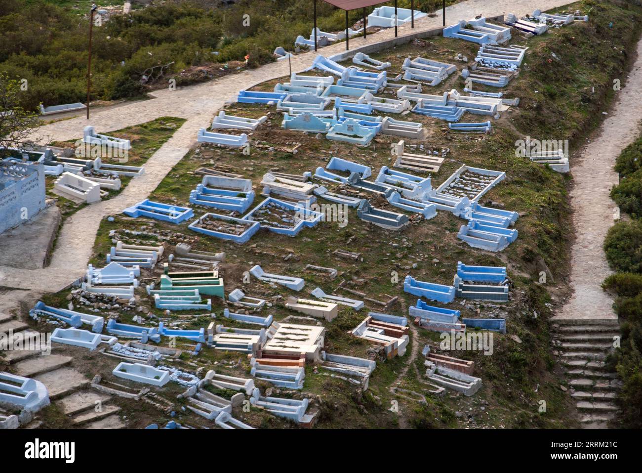 Blue colored graves at a courtyard in chefchaouen hi-res stock ...