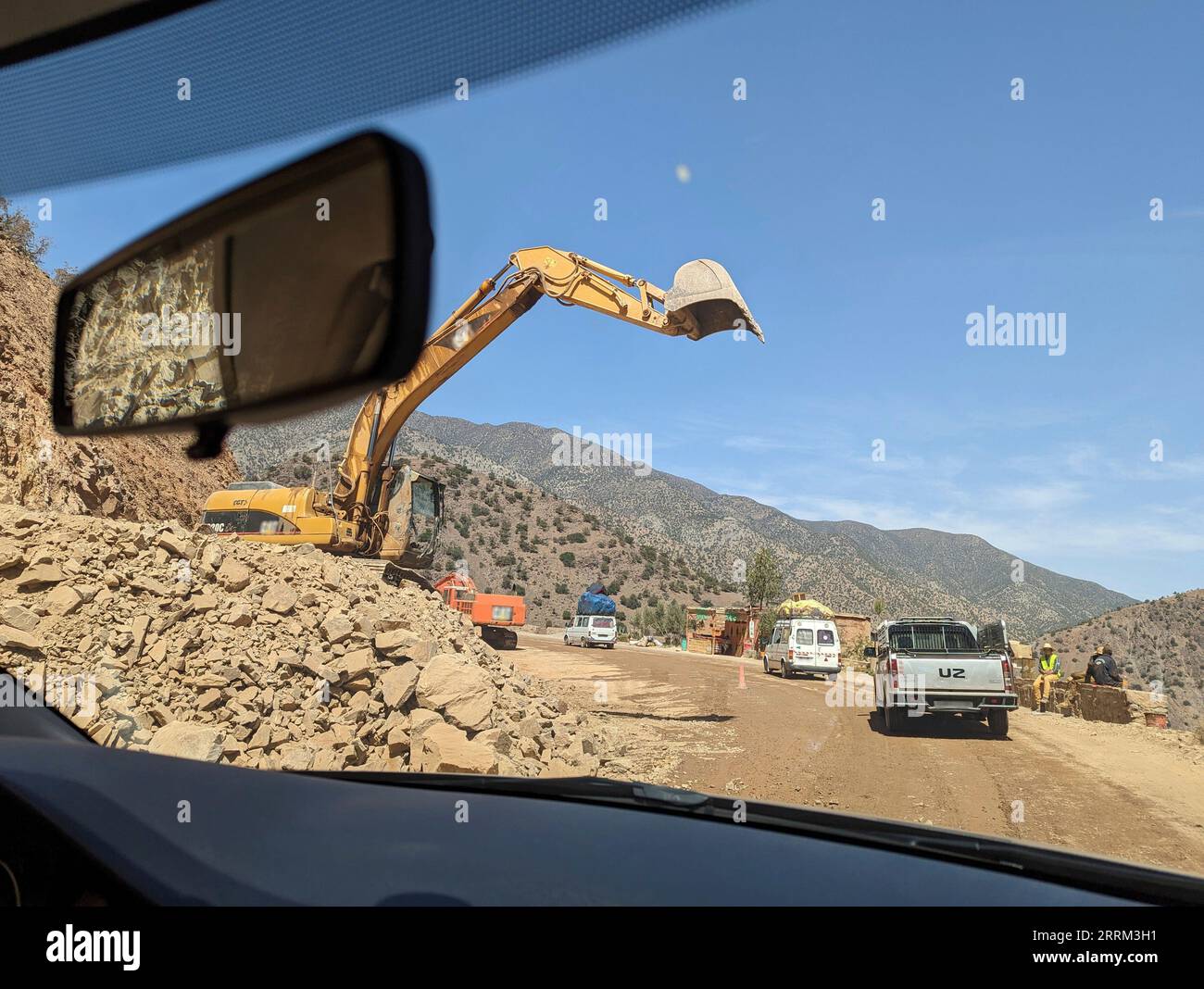 Primitive road construction site in the Moroccan Atlas mountains with a ...