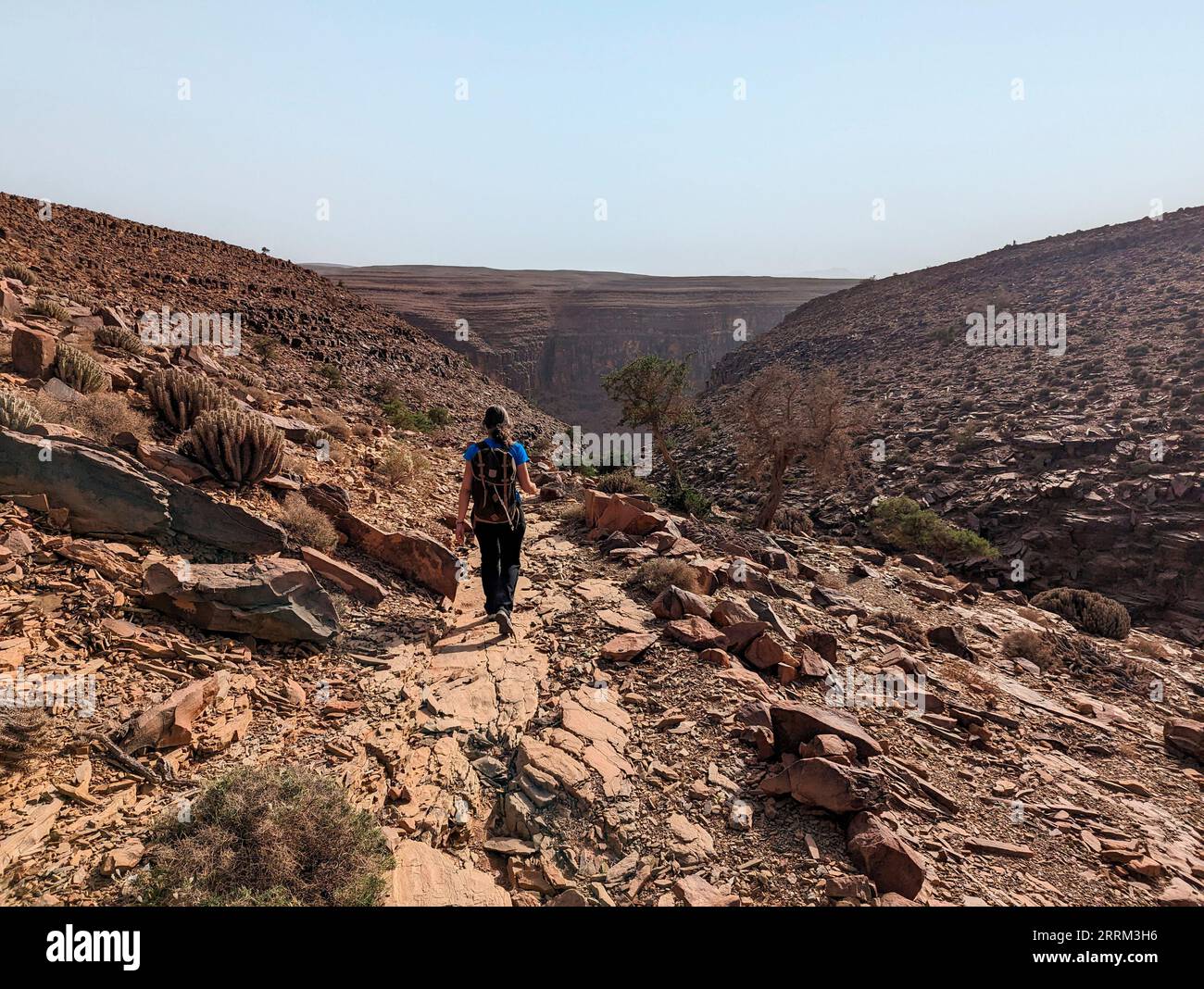 Hiking through the stone desert near Amtoudi in the Anti-Atlas, Morocco ...