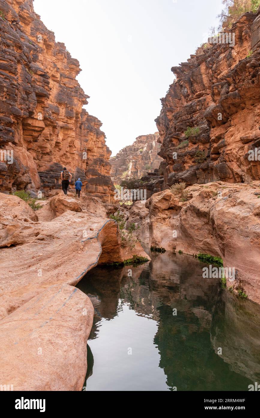 Hiking through the iconic Amtoudi canyon in the Anti-Atlas, Morocco ...